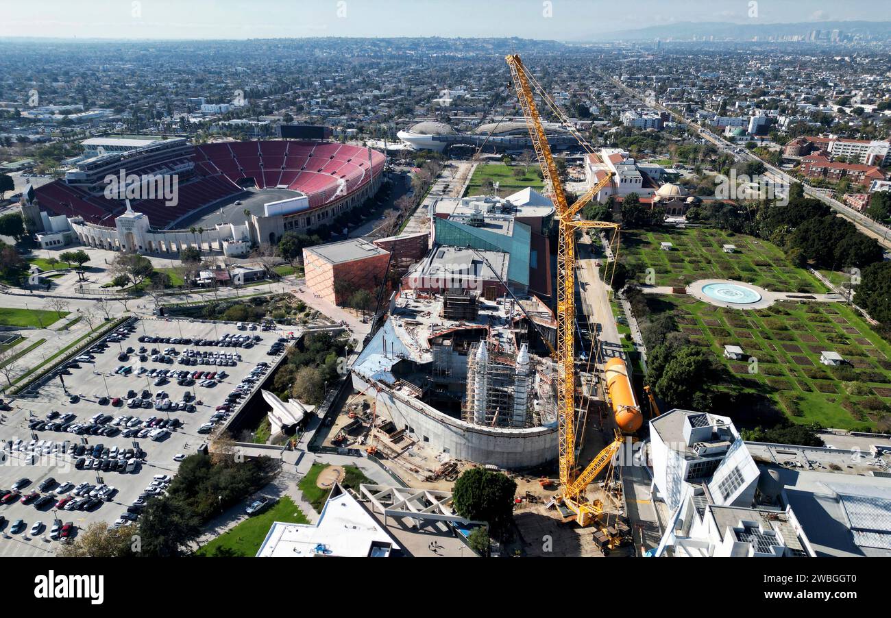 External Tank ET-94 is transported within Exposition Park by two self ...