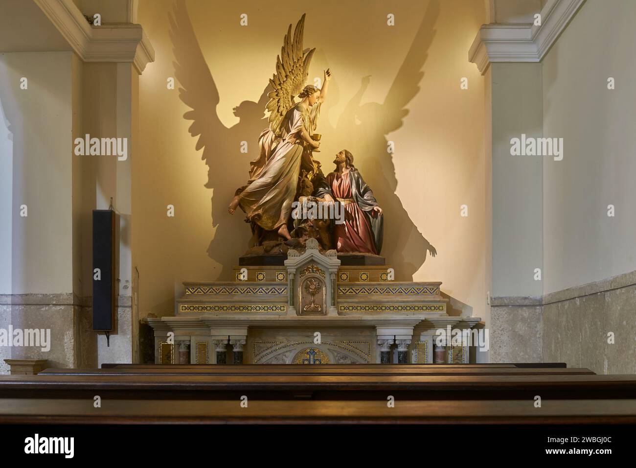 Interior of a catholic church high altar where you can see religious ...
