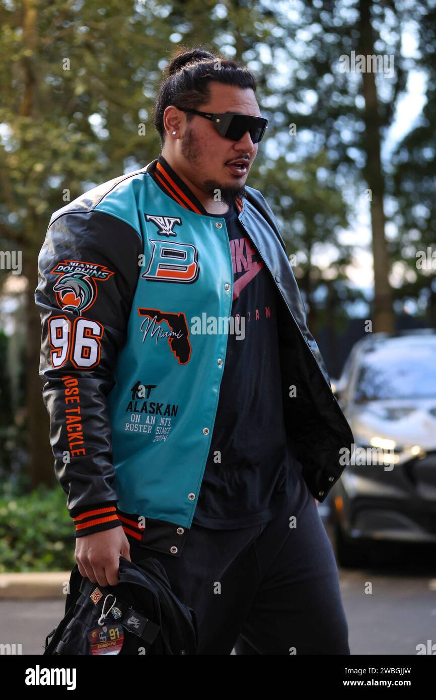 Miami Dolphins defensive tackle Brandon Pili (96) arrives at the ...
