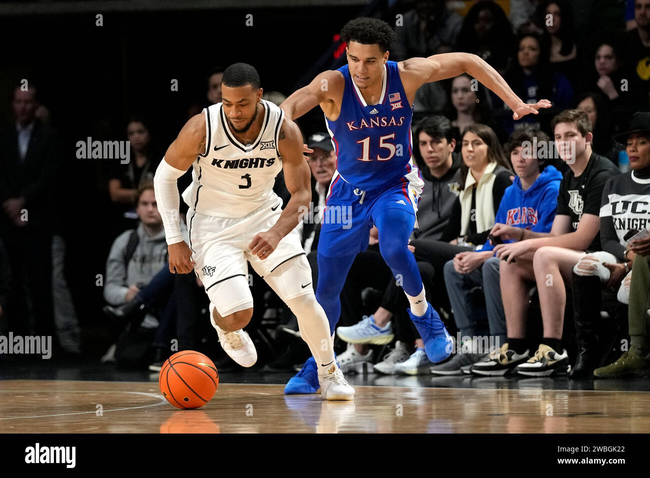 Central Florida guard Darius Johnson (3) gets in front of Kansas guard ...