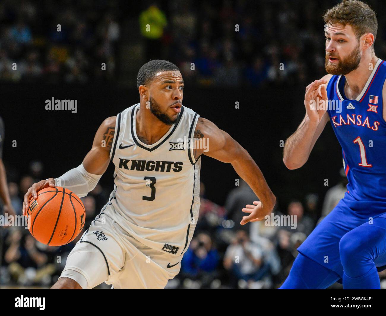January 10, 2024: Kansas Jayhawks center Hunter Dickinson (1) defends a drive by UCF Knights ...