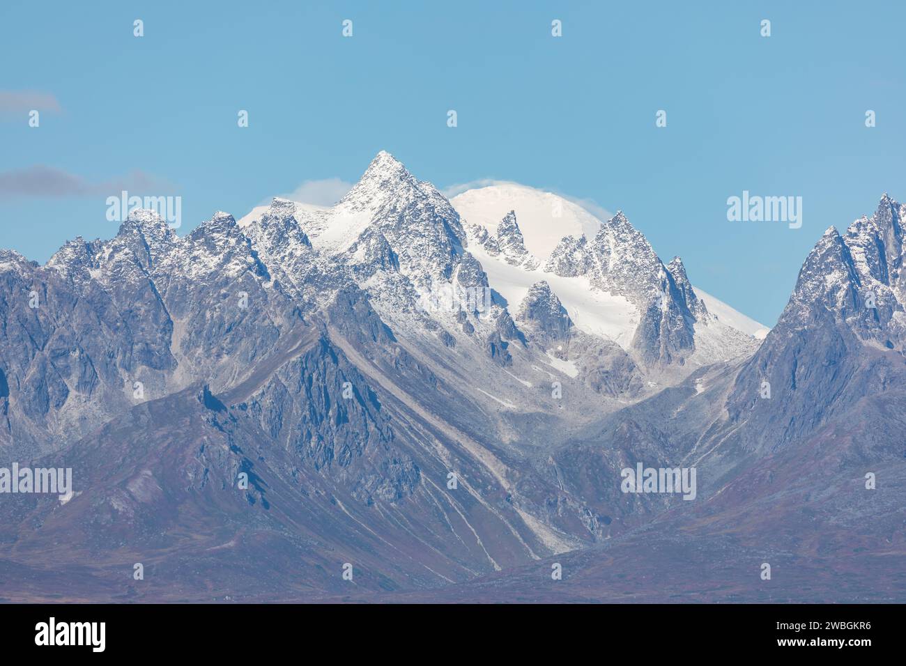 Glaciers fill the high valleys between the sharp peaks of the Alaska ...