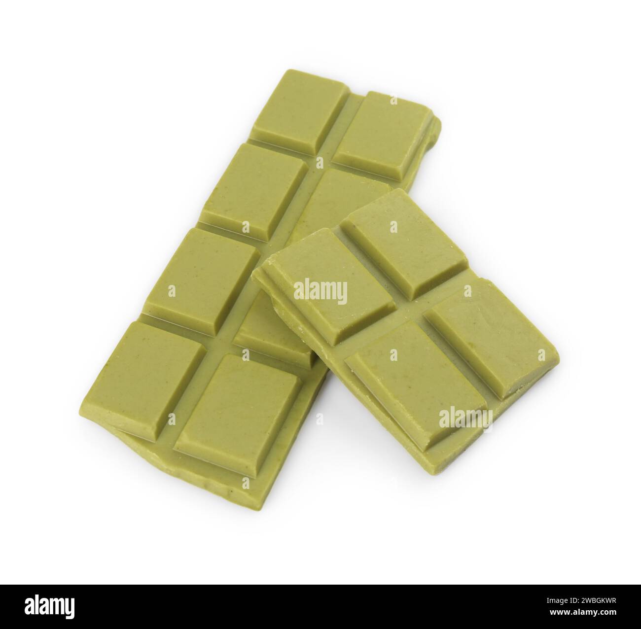 Pieces of tasty matcha chocolate bar isolated on white Stock Photo - Alamy