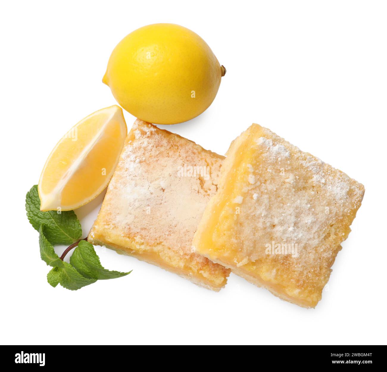 Tasty lemon bars with powdered sugar, fruits and mint isolated on white ...