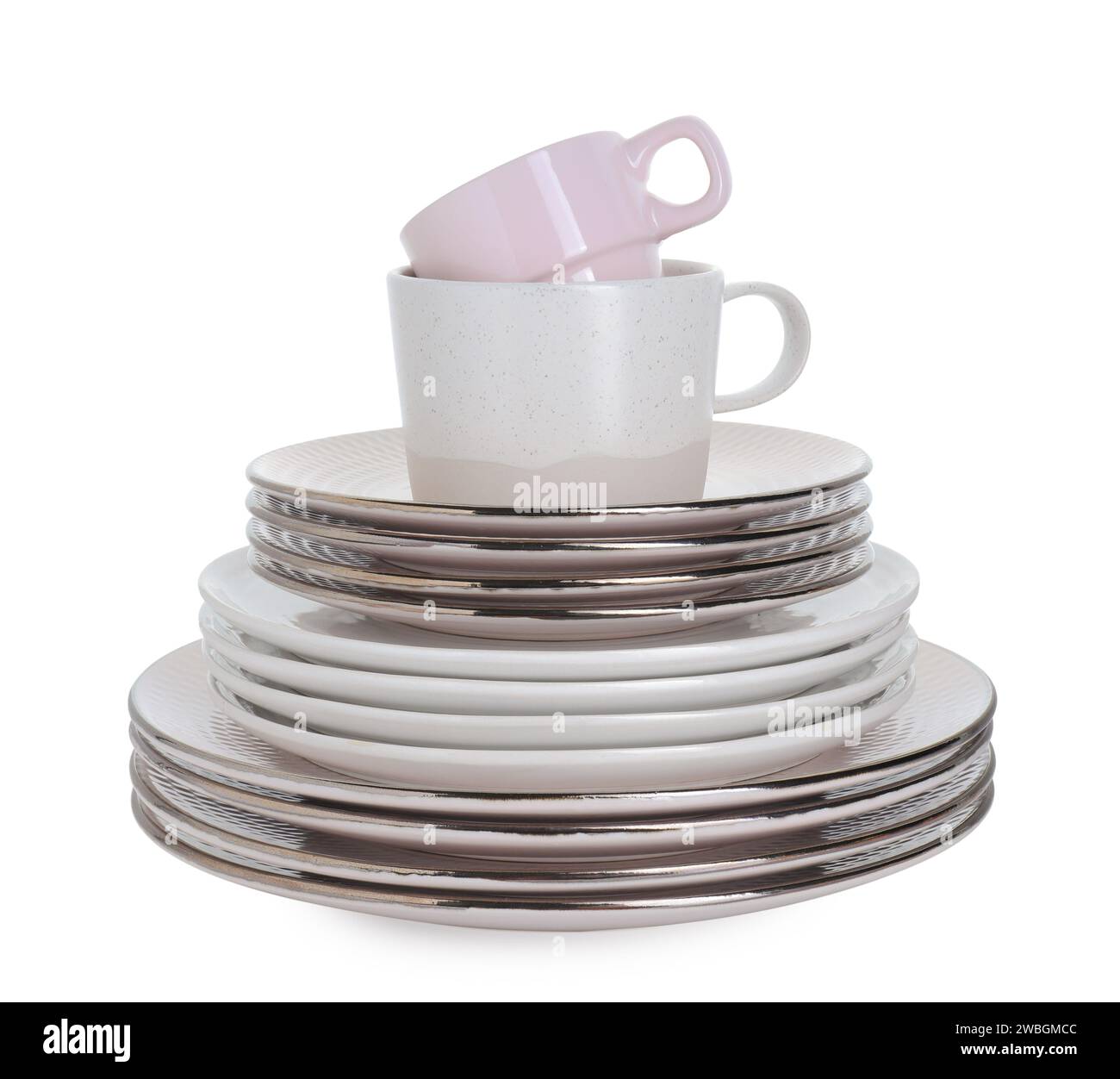 Beautiful ceramic plates and cups isolated on white Stock Photo - Alamy