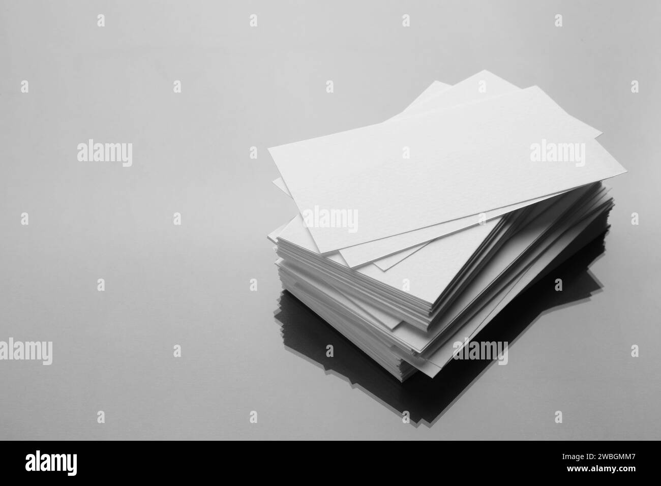 Blank business cards on mirror surface. Mockup for design Stock Photo ...