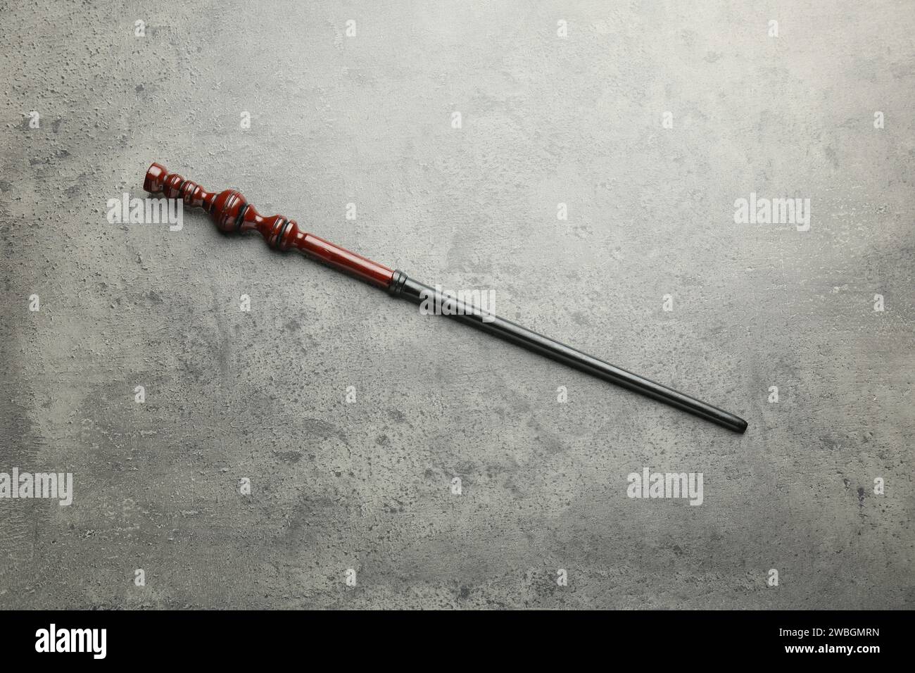 Magic wand on light grey background, top view Stock Photo - Alamy