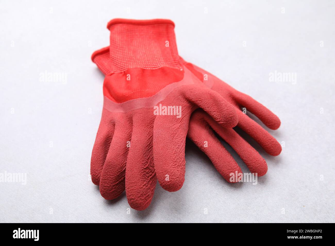 Light red gloves hi-res stock photography and images - Alamy