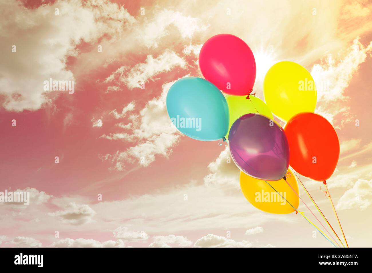 Colorful balloons flying hi-res stock photography and images - Alamy