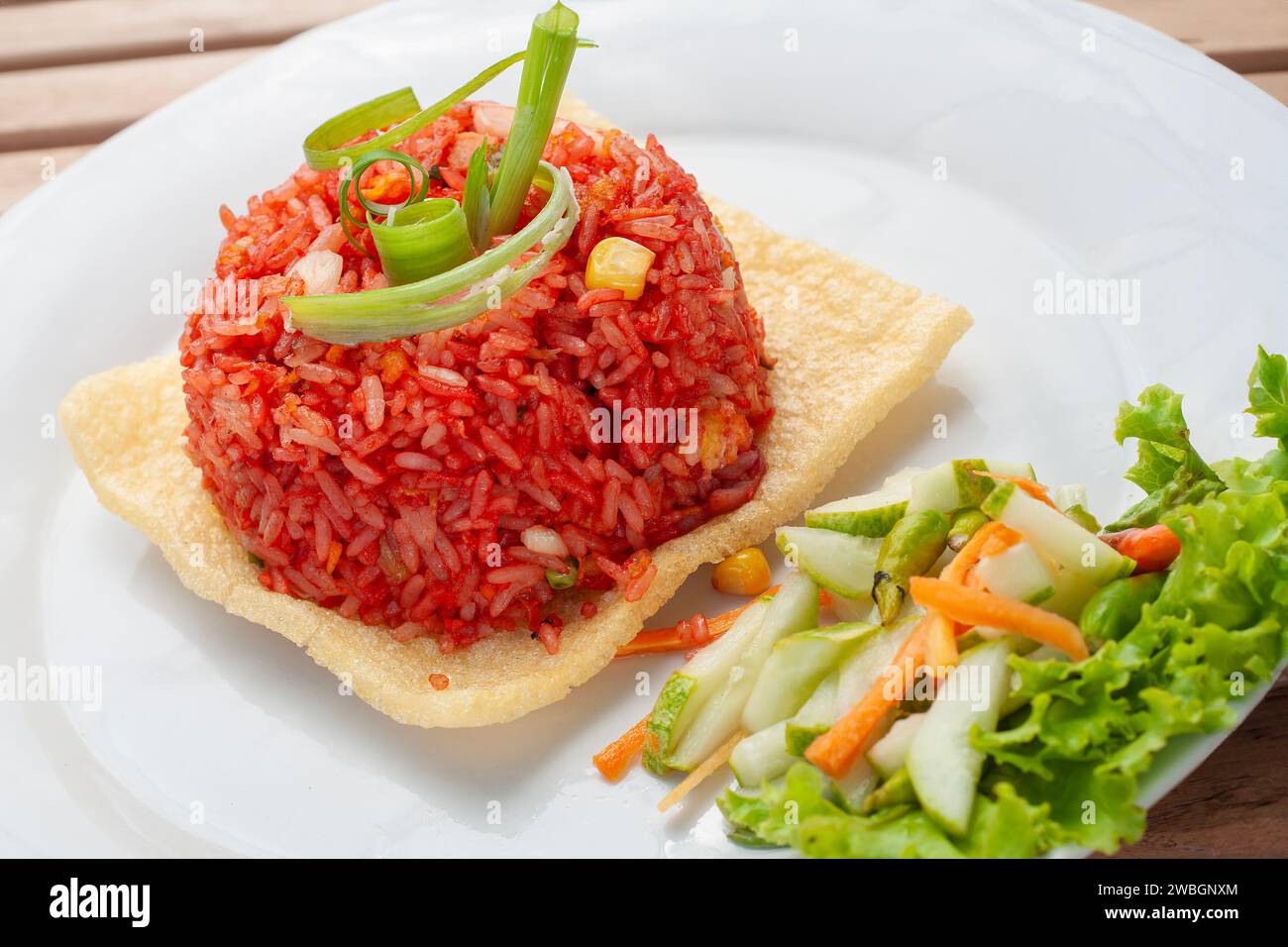 Red Fried Rice is made from rice fried with spicy spices and garnished ...
