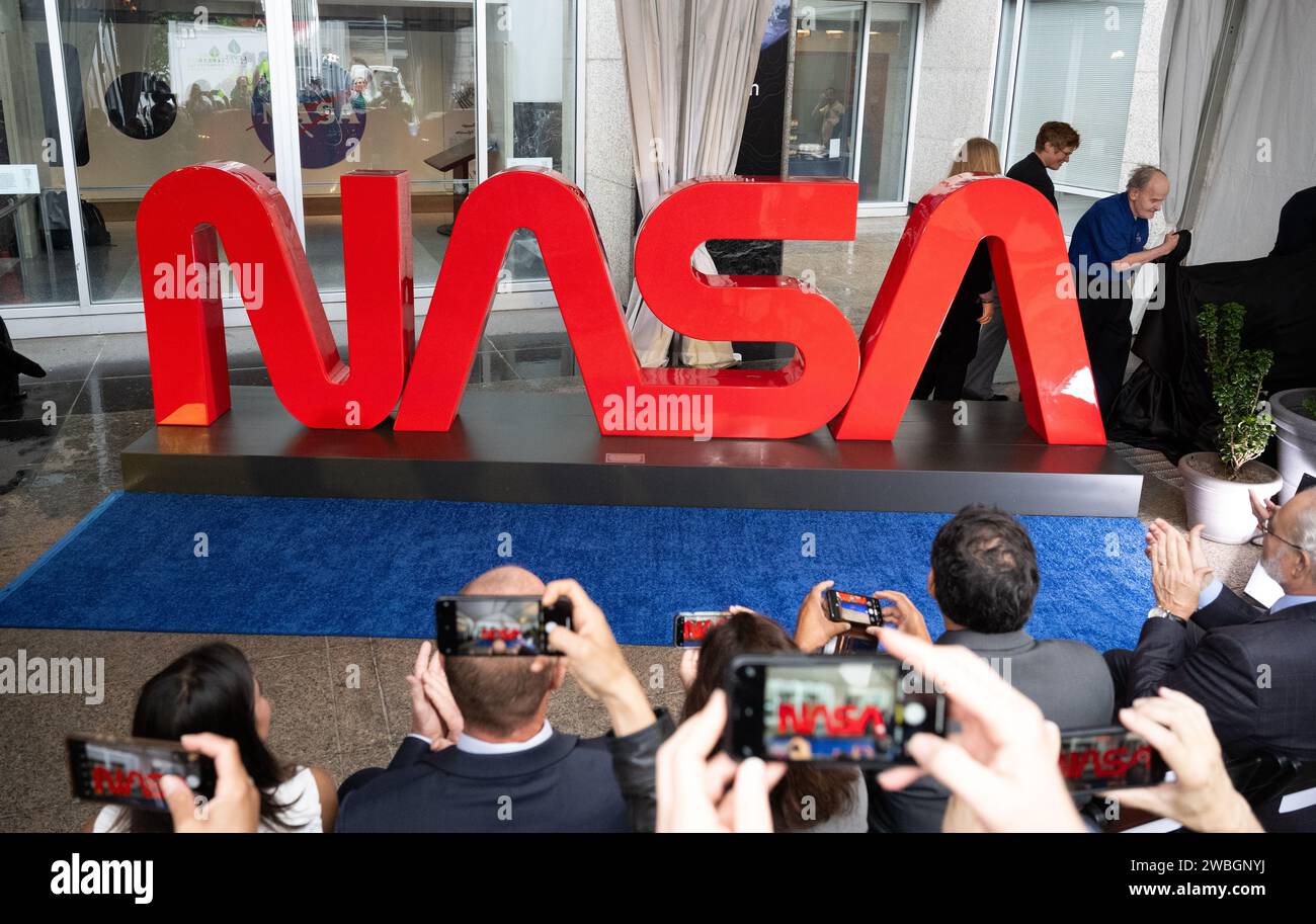 The NASA Worm Logo sign is unveiled before the ribbon cutting ceremony ...