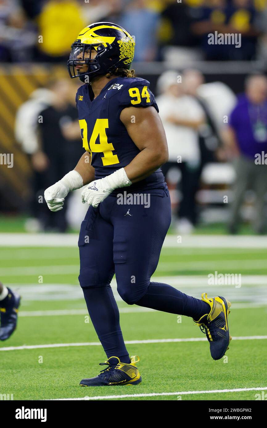HOUSTON, TX - JANUARY 08: Michigan Wolverines defensive lineman Kris Jenkins (94) pursues a play ...