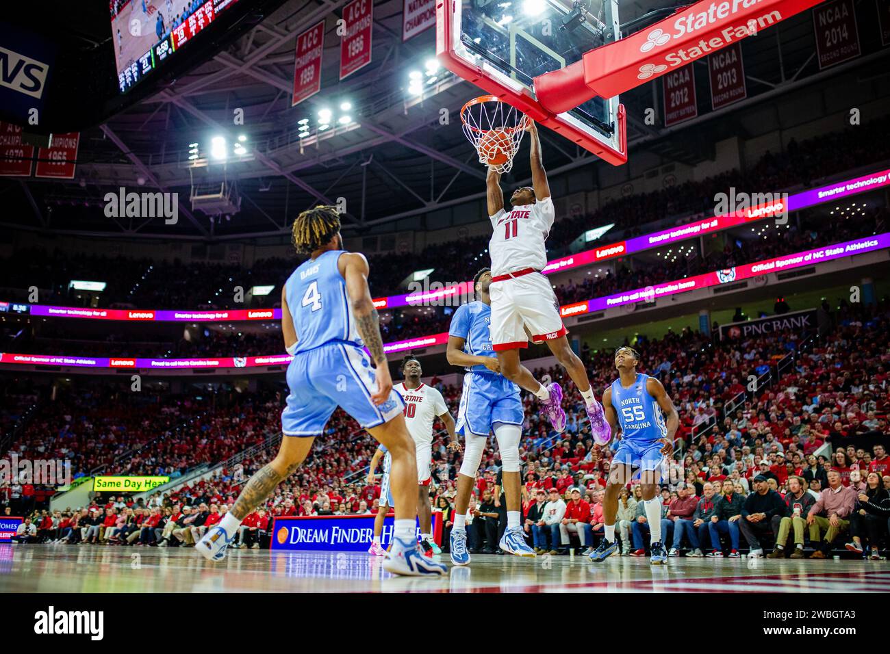 January 10, 2024: NC State Wolfpack guard Dennis Parker Jr. (11) dunks ...