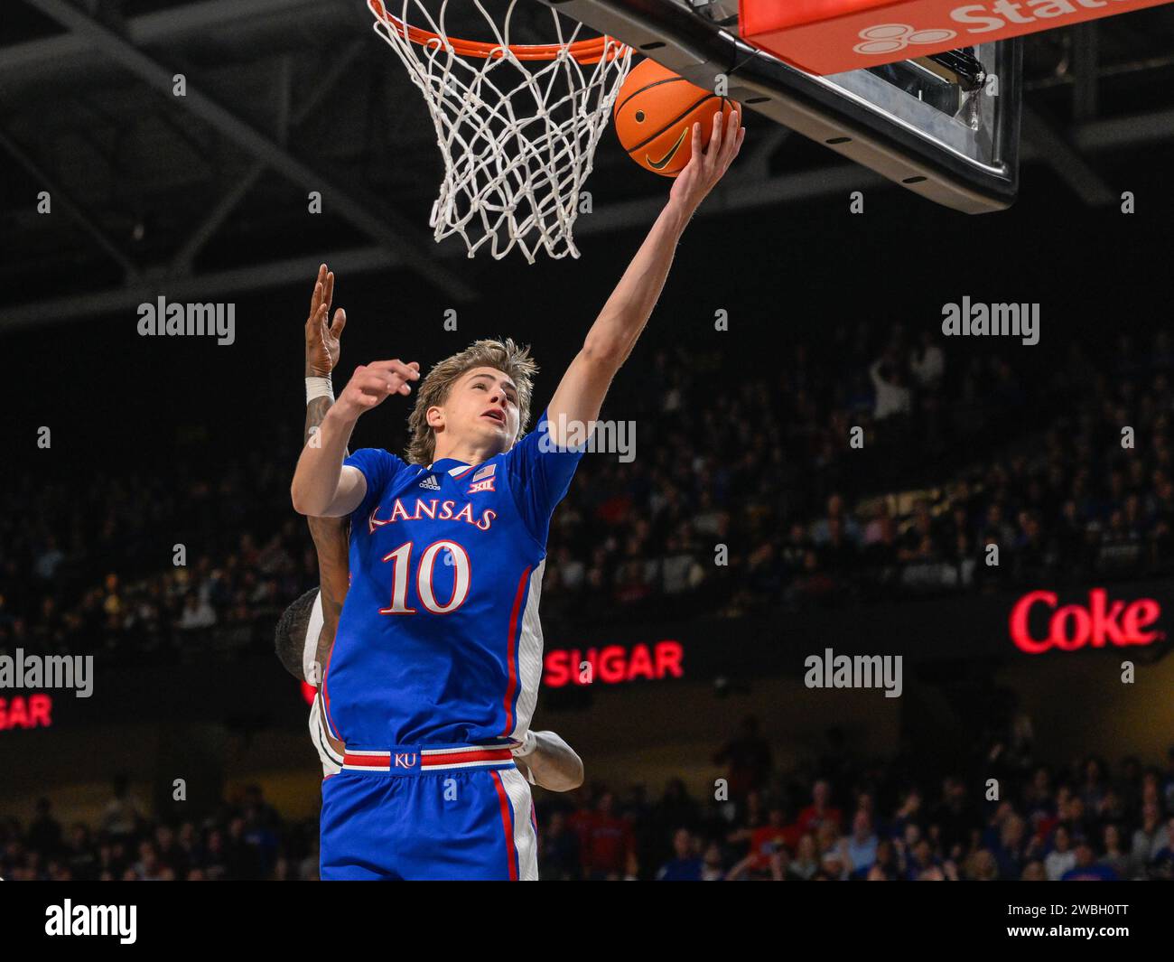 January 10, 2024: Kansas Jayhawks guard Johnny Furphy (10) lays the ...