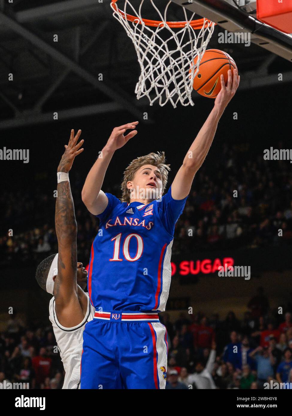 January 10, 2024: Kansas Jayhawks guard Johnny Furphy (10) lays the ...