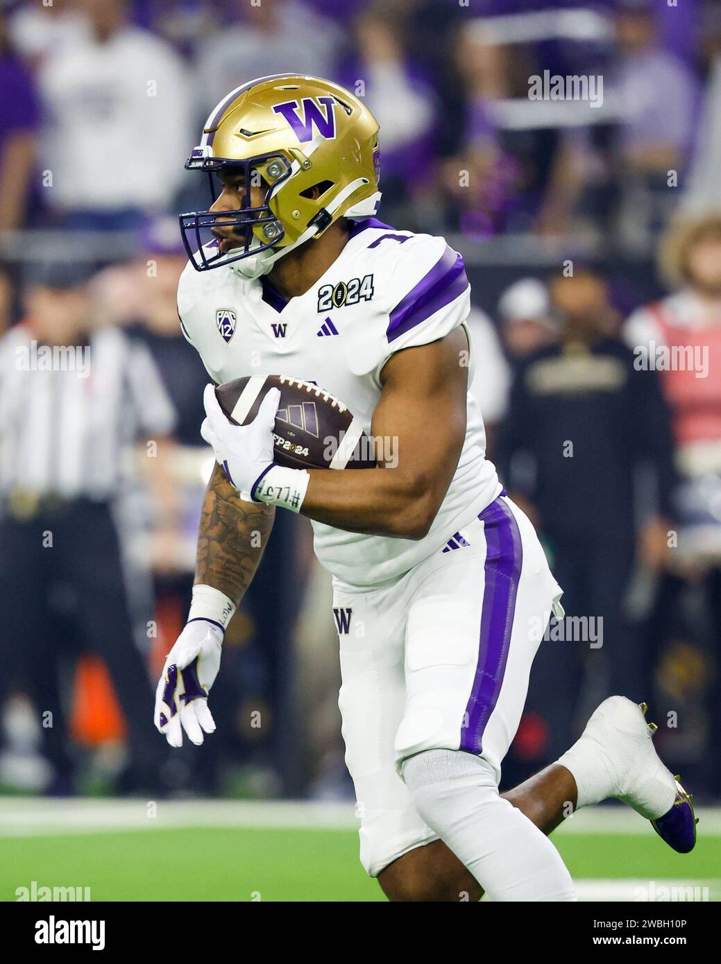 Houston, TX, USA. 8th Jan, 2024. Washington Huskies running back Dillon ...