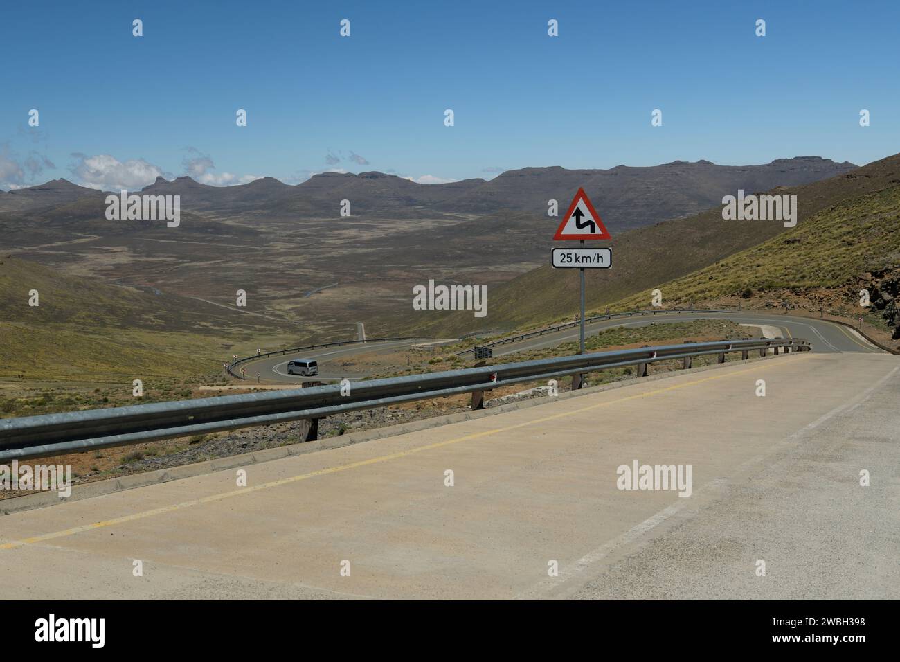African taxi van travelling on mountain pass, rural landscape Kingdom ...