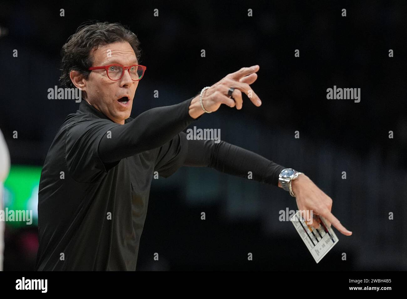 Atlanta Hawks head coach Quin Snyder directs his players on the court ...