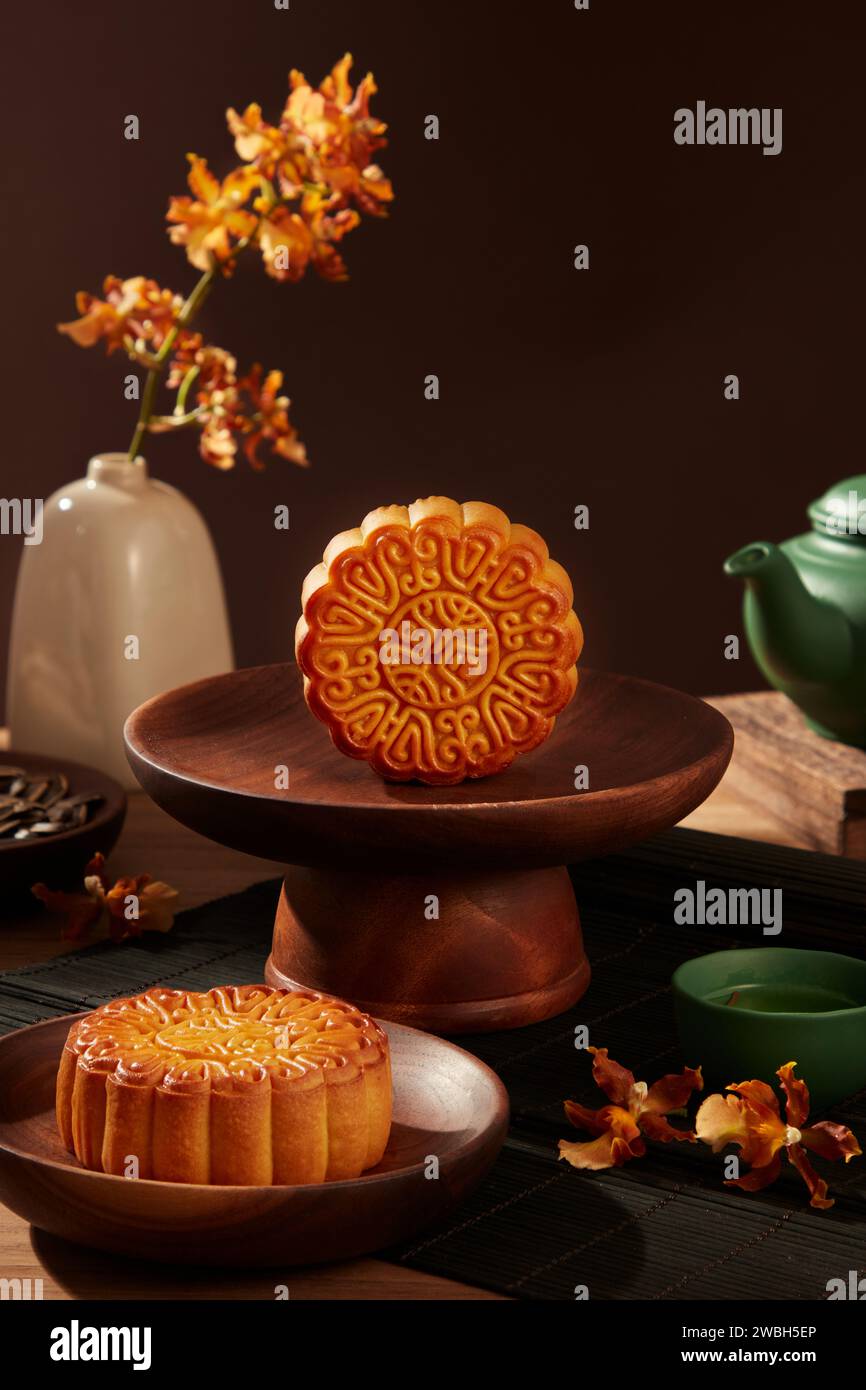 Delicious Chinese traditional mooncakes displayed on wooden dishes ...