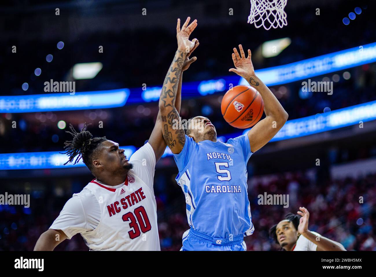 January 10, 2024: NC State Wolfpack forward DJ Burns Jr. (30) fouls ...