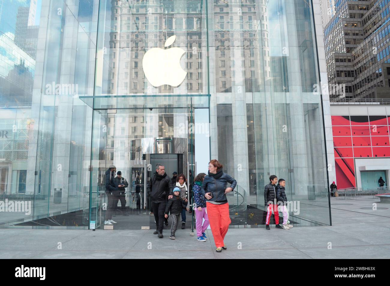 New York, United States. 10th Jan, 2024. Customers exit an Apple store ...