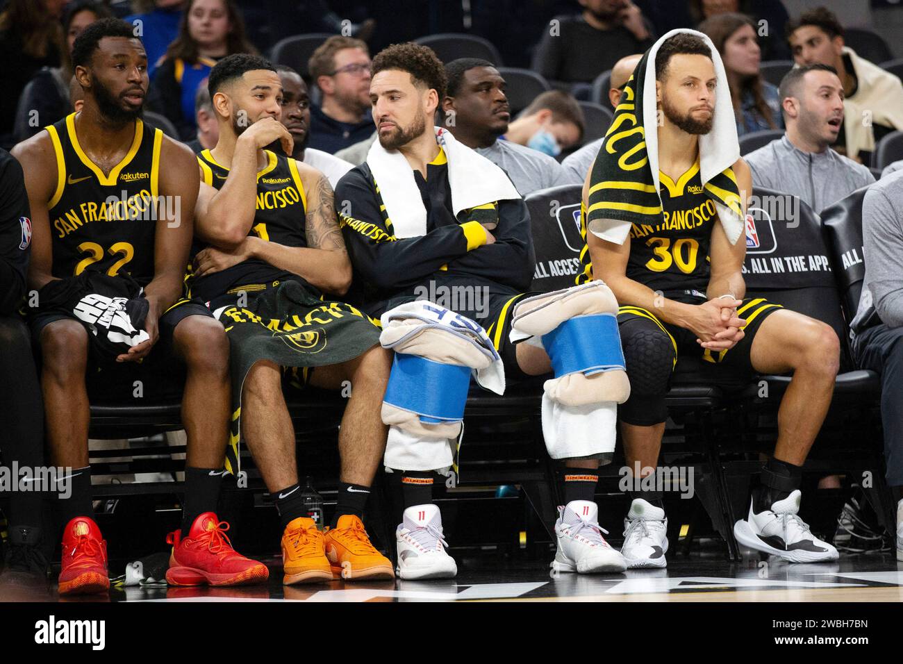 Golden State Warriors players Andrew Wiggins (22), Cory Joseph, Klay Thompson and Stephen Curry ...