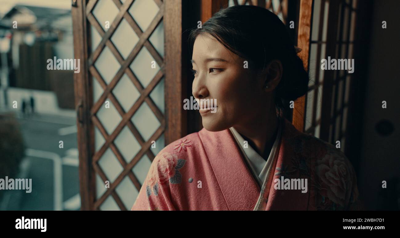 Japanese woman, window view and kimono for traditional style in home ...