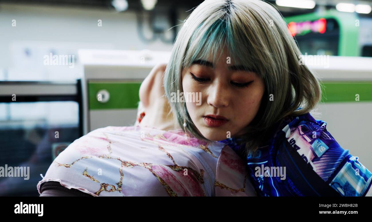 Japanese women, friends hug and city by train station with care ...