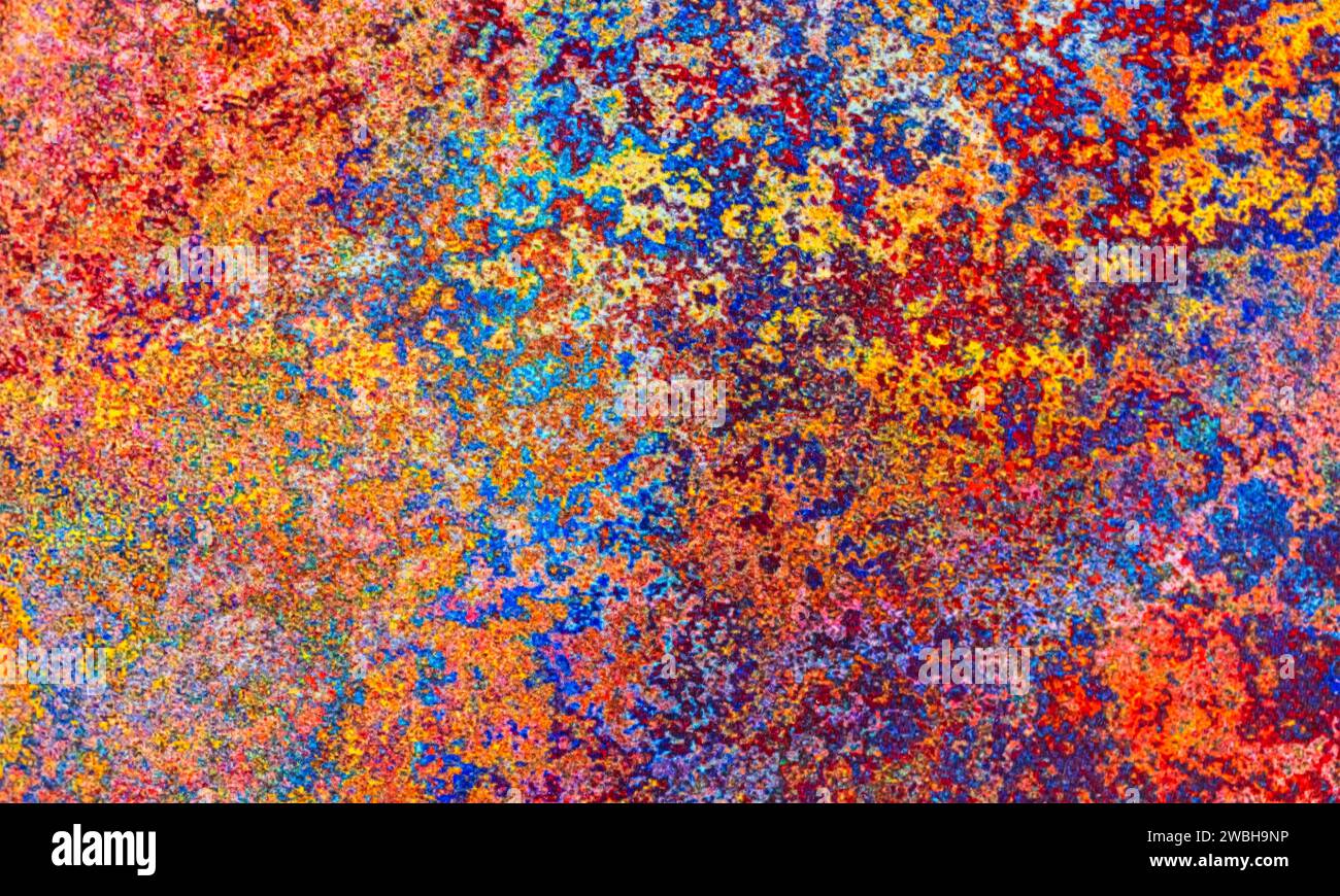Abstract colorful background with chaotic spots of paint over canvas ...