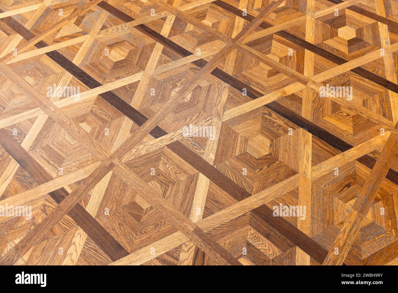Vintage luxary parquet made of various wood types planks with geometric ...