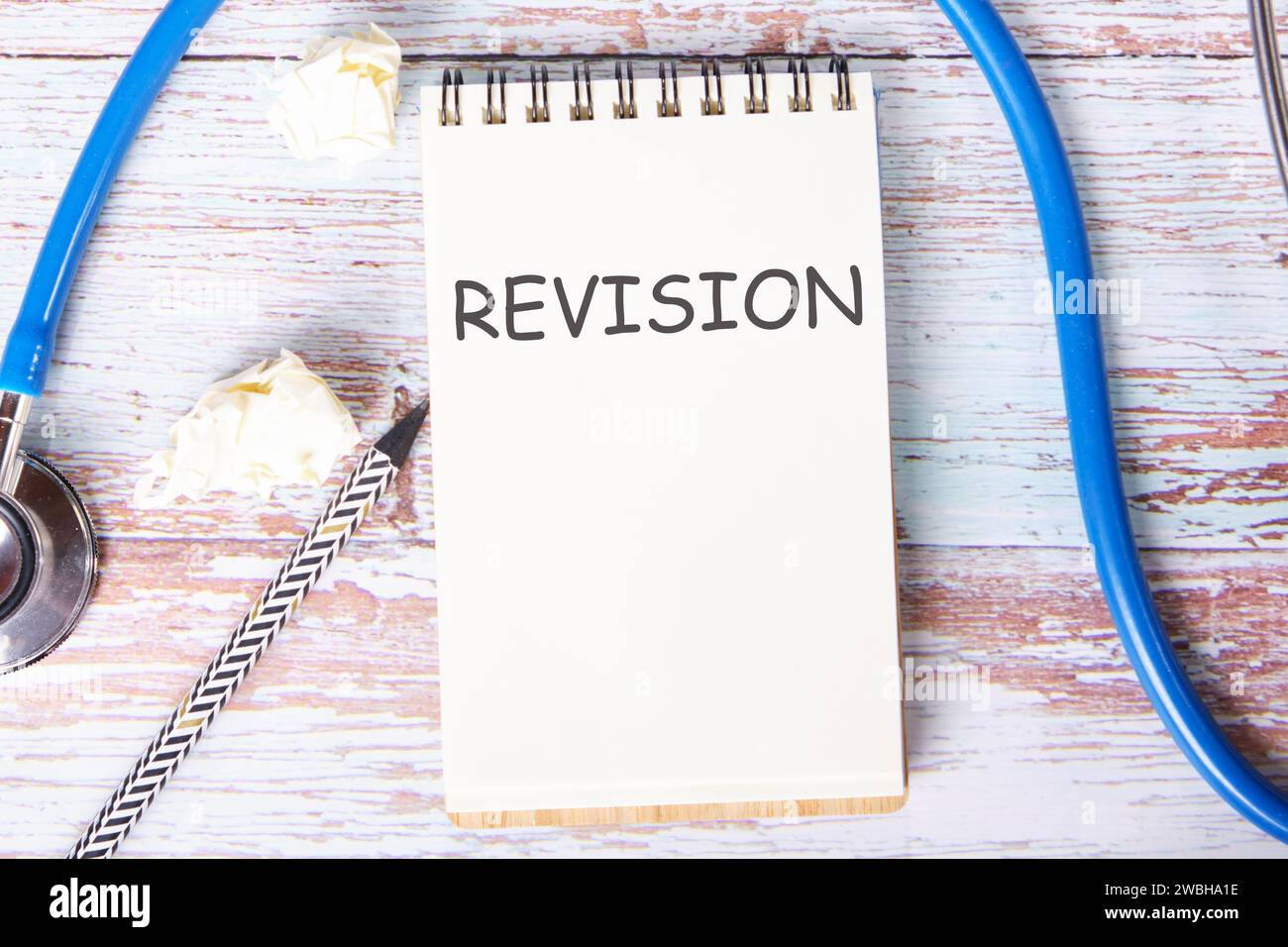 REVISION the text is written on a notebook that lies on old vintage ...