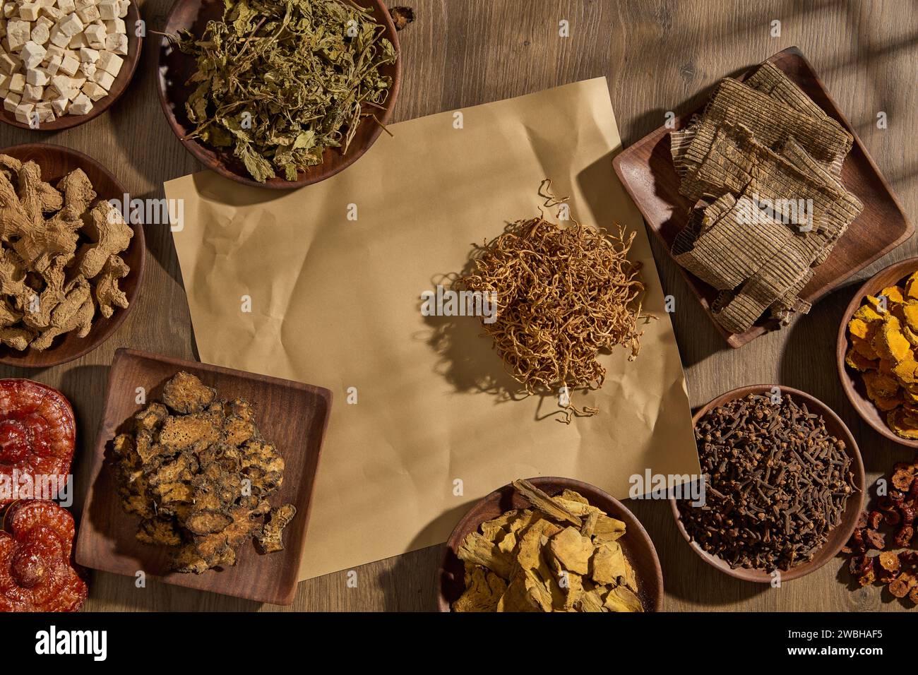 Healthy medicine concept with different types of traditional herbal ...