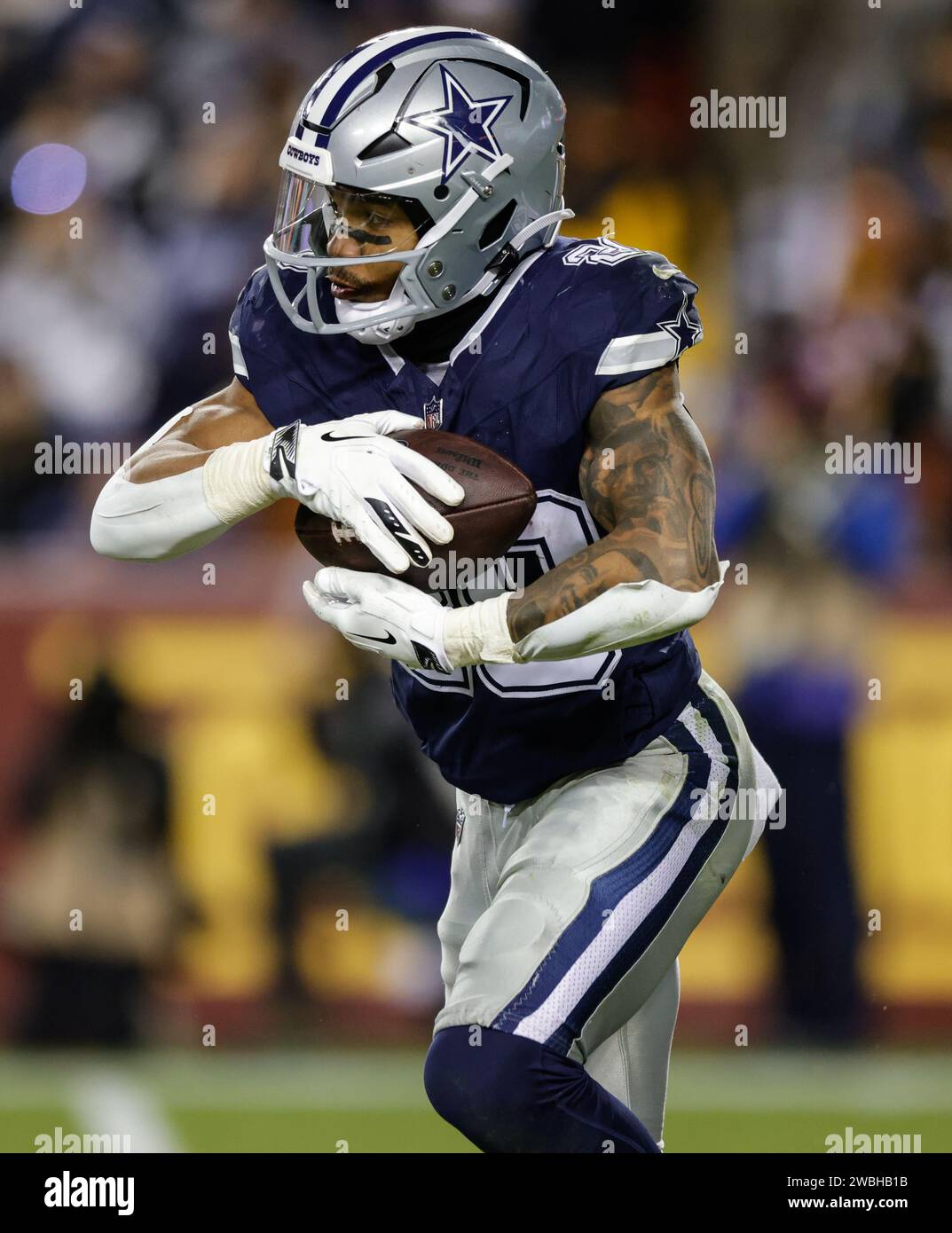 Dallas Cowboys running back Tony Pollard (20) with the carry against ...