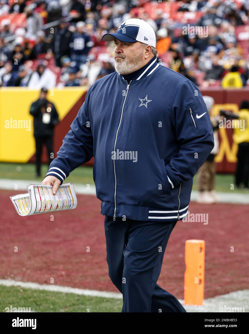 Dallas Cowboys head coach Mike McCarthy taking the field before the ...