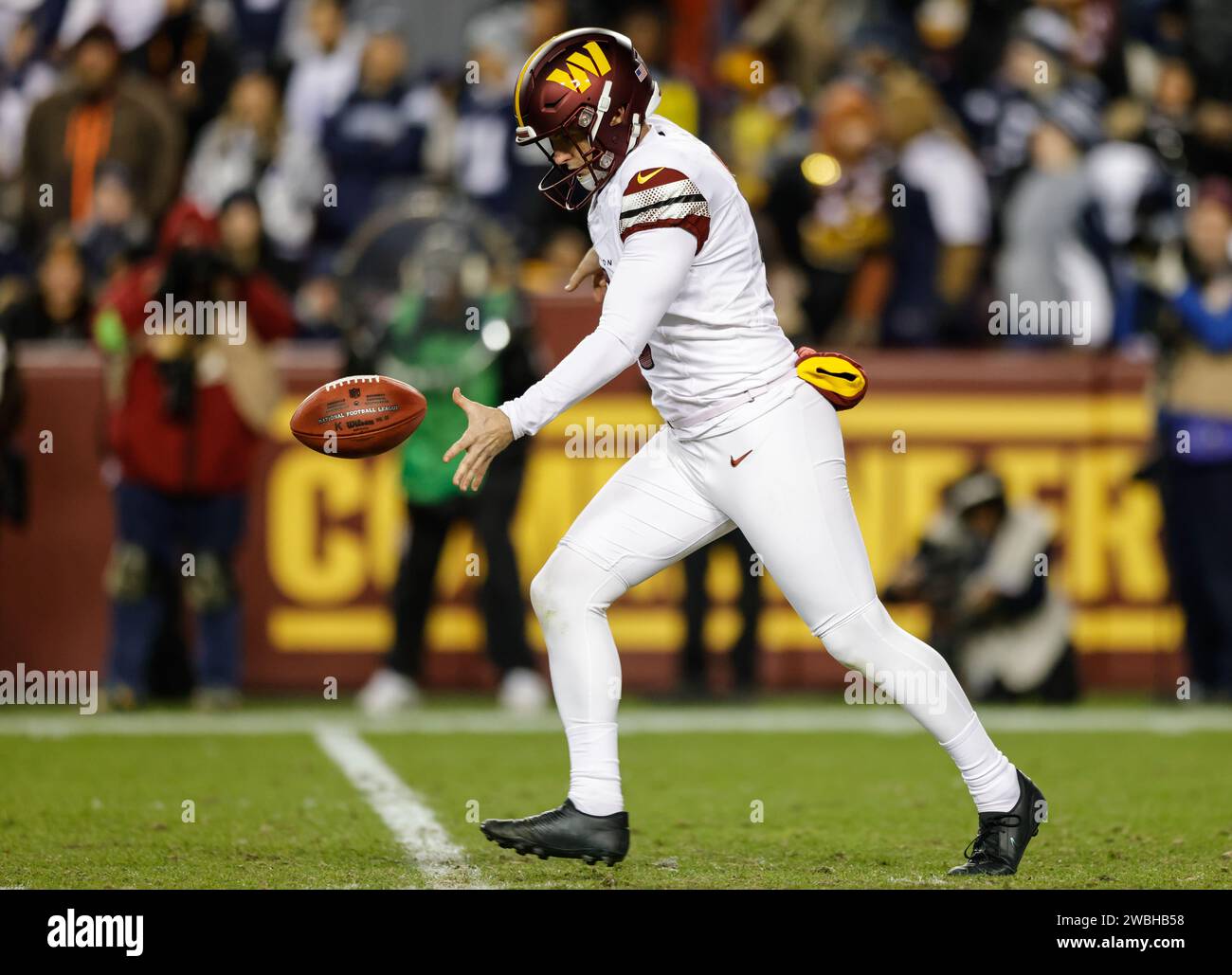 Washington Commanders punter Tress Way (5) set to punt the ball away to ...