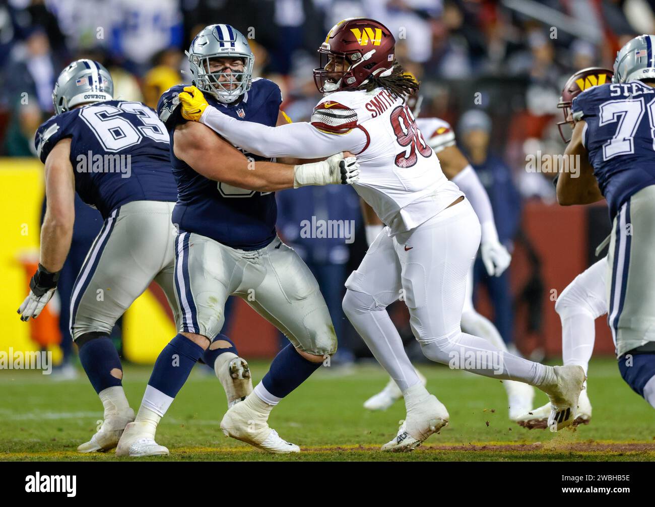 Washington Commanders defensive end James Smith-Williams (96) grabs ...