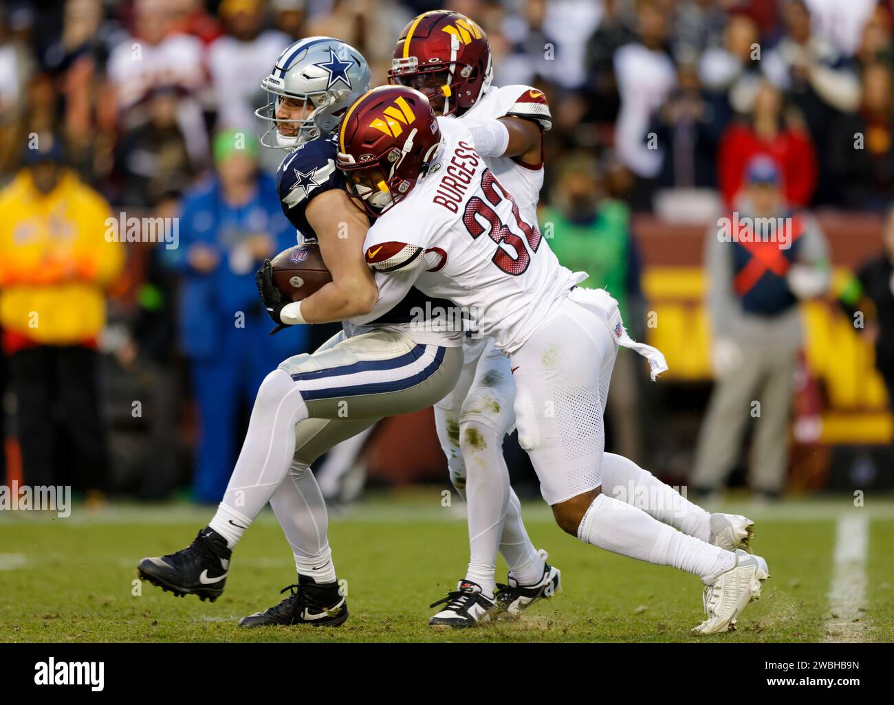 Washington Commanders safety Terrell Burgess (32) tackling Dallas ...