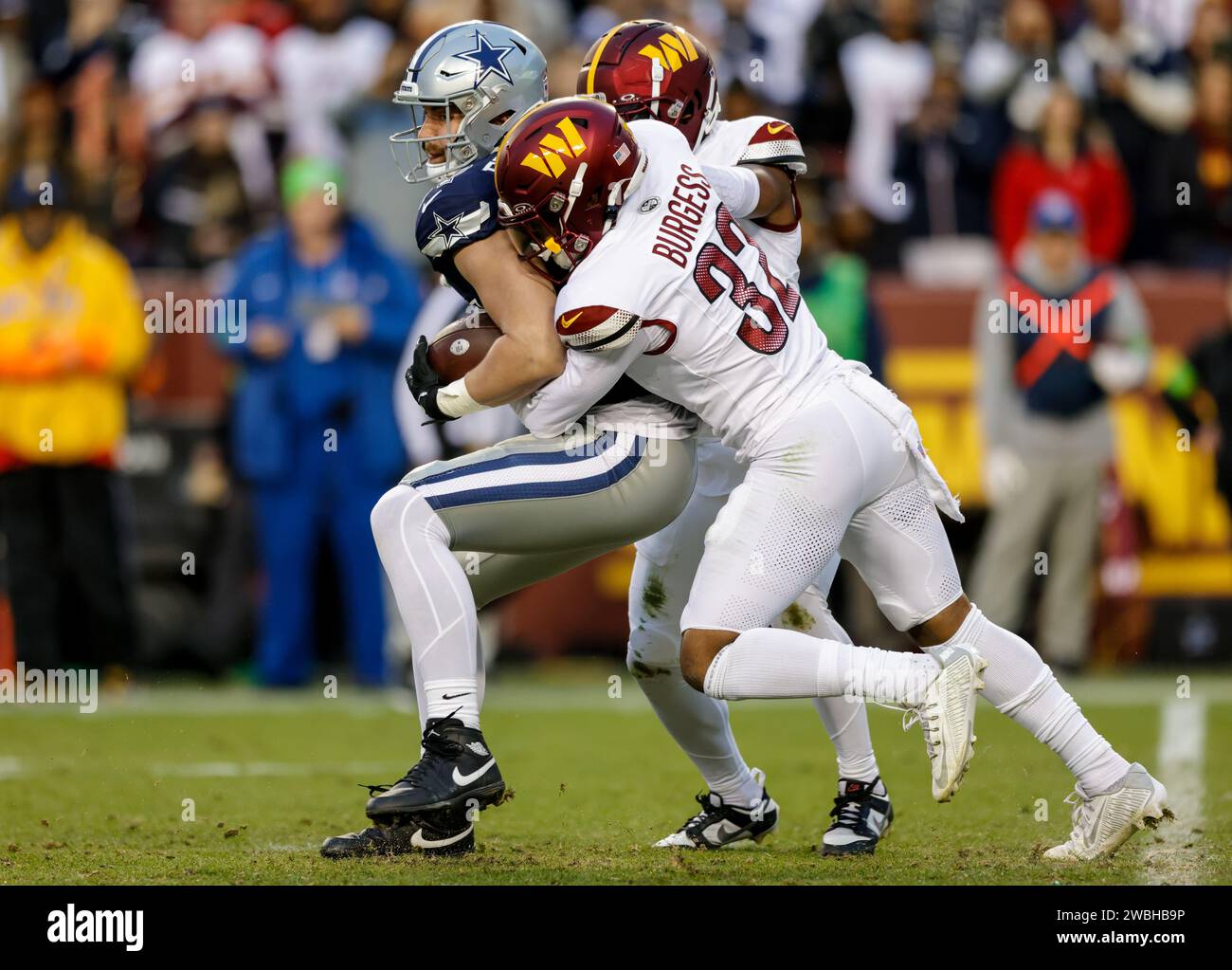 Washington Commanders safety Terrell Burgess (32) tackling Dallas ...