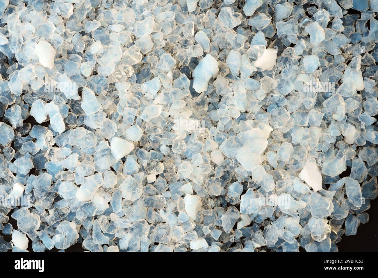 Pure silica gel crystals on black background Stock Photo - Alamy