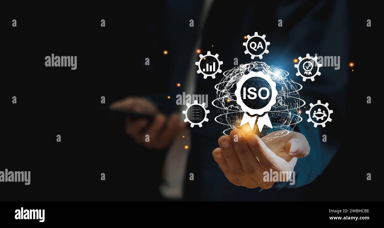 Businessman ISO symbol showing quality assurance on virtual screen ...
