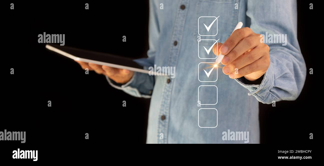 Businessman making correct marks, marks for checklist, document quality ...