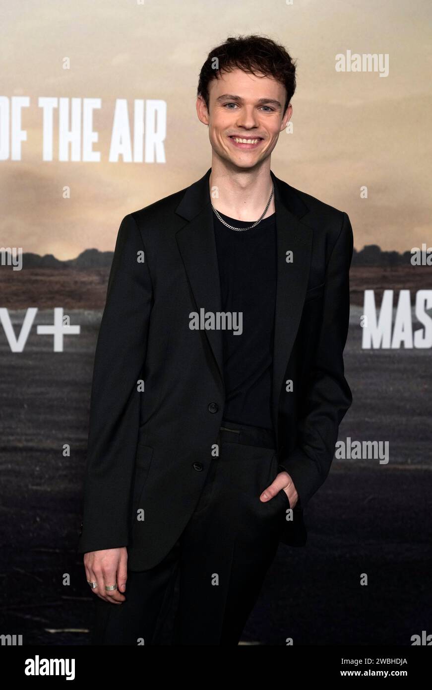 Jonas Moore poses at the world premiere of "Masters of the Air ...