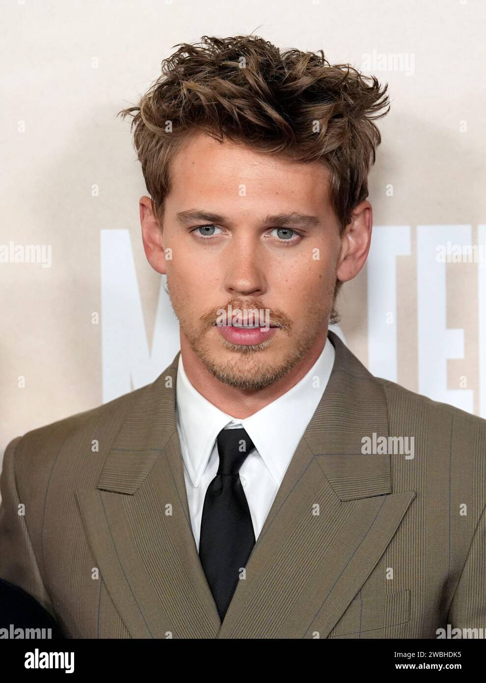 Austin Butler poses at the world premiere of "Masters of the Air ...