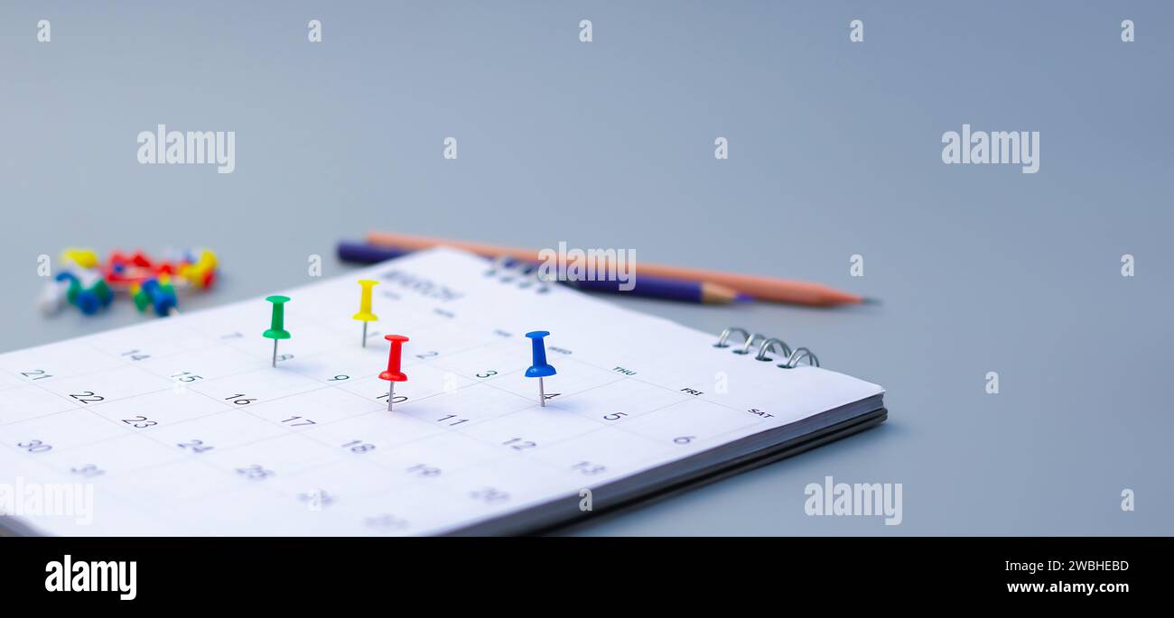 Calendar and scheduled appointments with pins Stock Photo - Alamy