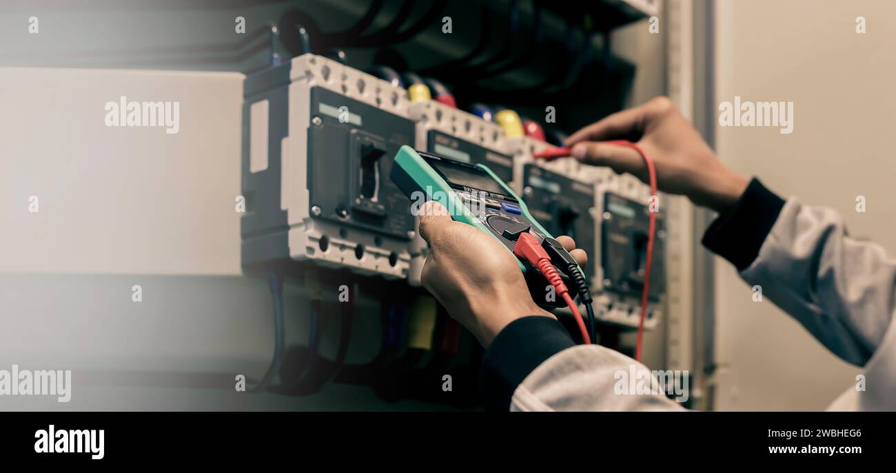 Electrician Engineer Work Tester Measuring Voltage And Current Of Power Electric Line In