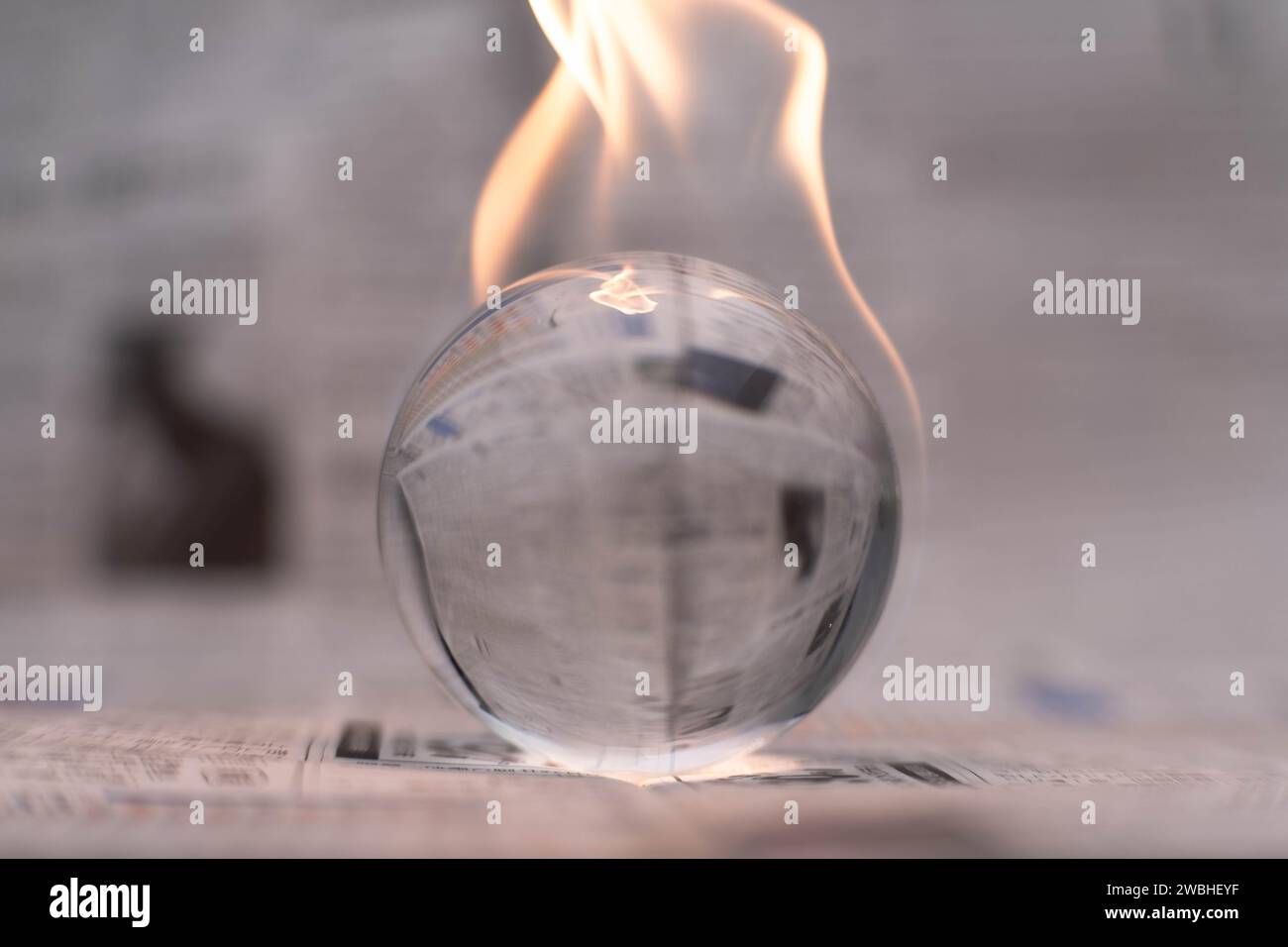 Glass globe on fire. Planet Earth Burning. Global Warming and Climate ...