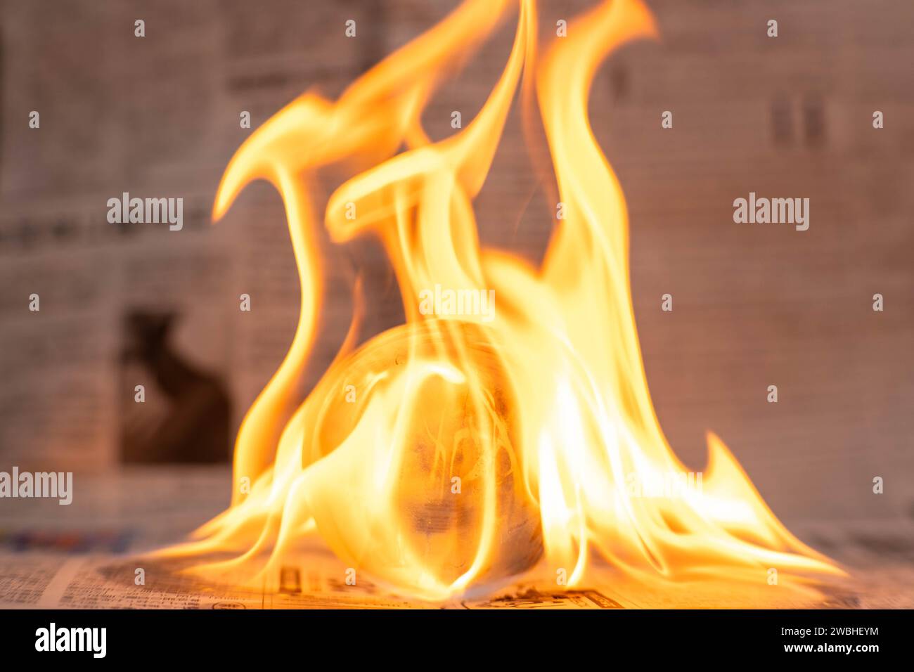 Glass globe on fire. Planet Earth Burning. Global Warming and Climate ...