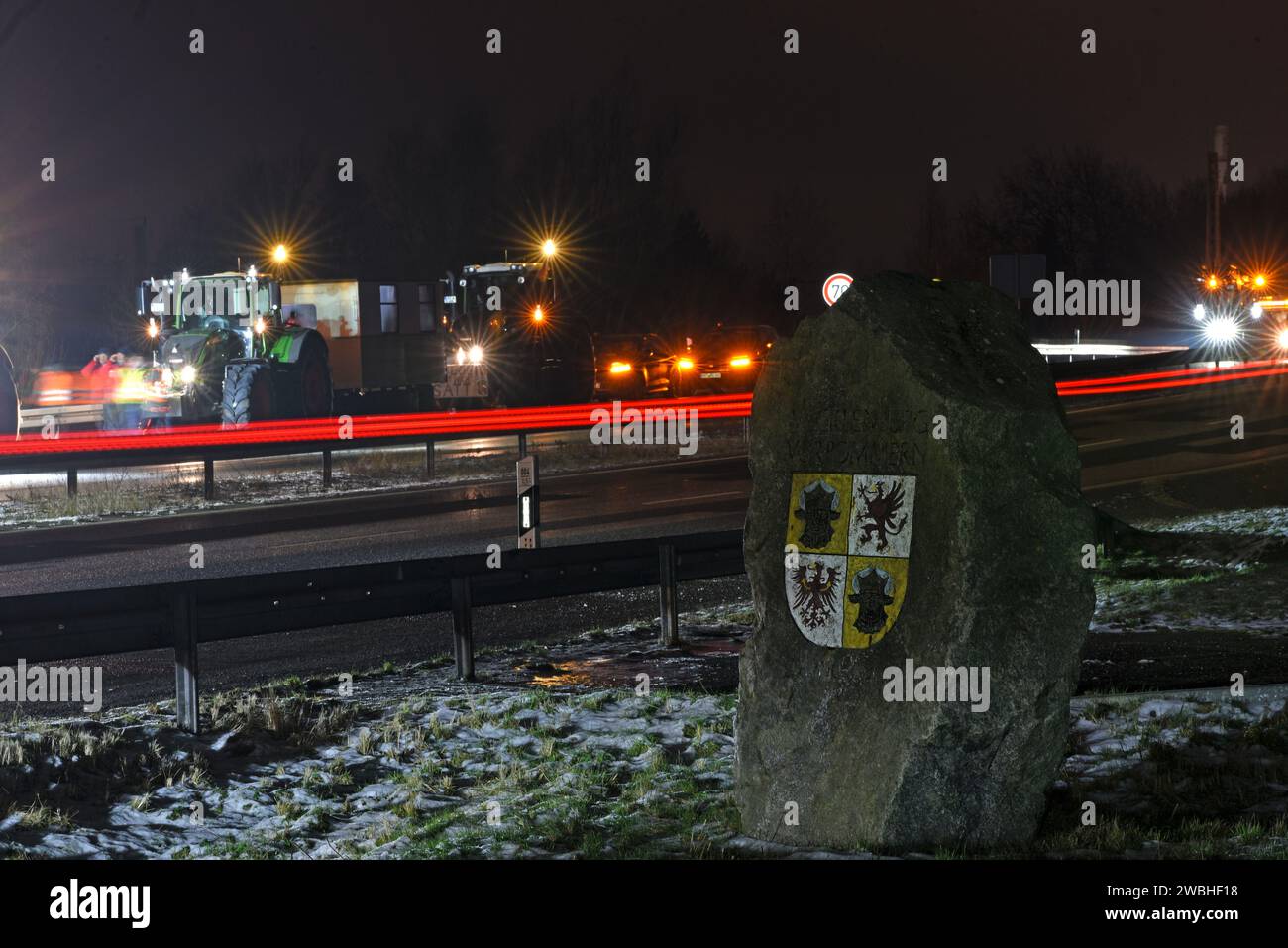 Rostock, Germany. 11th Jan, 2024. Convoys of tractors block the Rostock ...