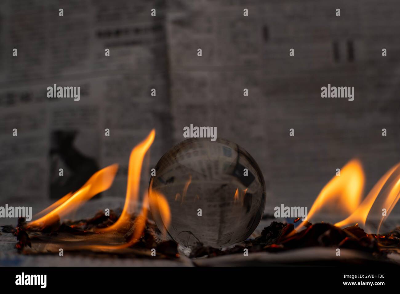 Glass globe on fire. Planet Earth Burning. Global Warming and Climate ...