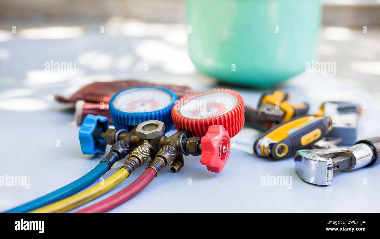 Tools for air conditioning repair and maintenance Stock Photo - Alamy